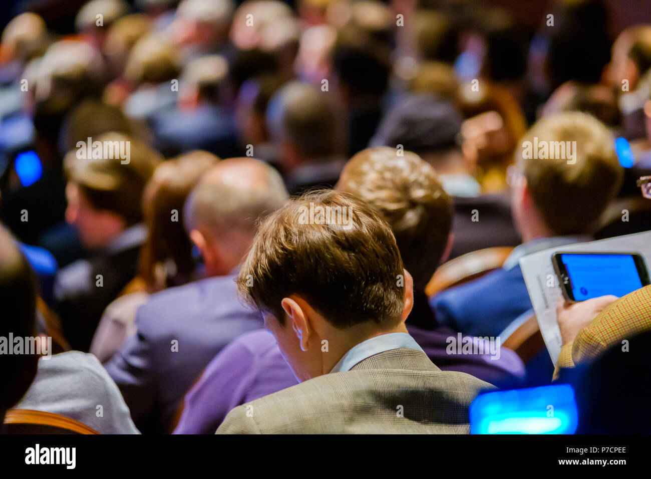 People attend business conference in the congress hall Stock Photo - Alamy
