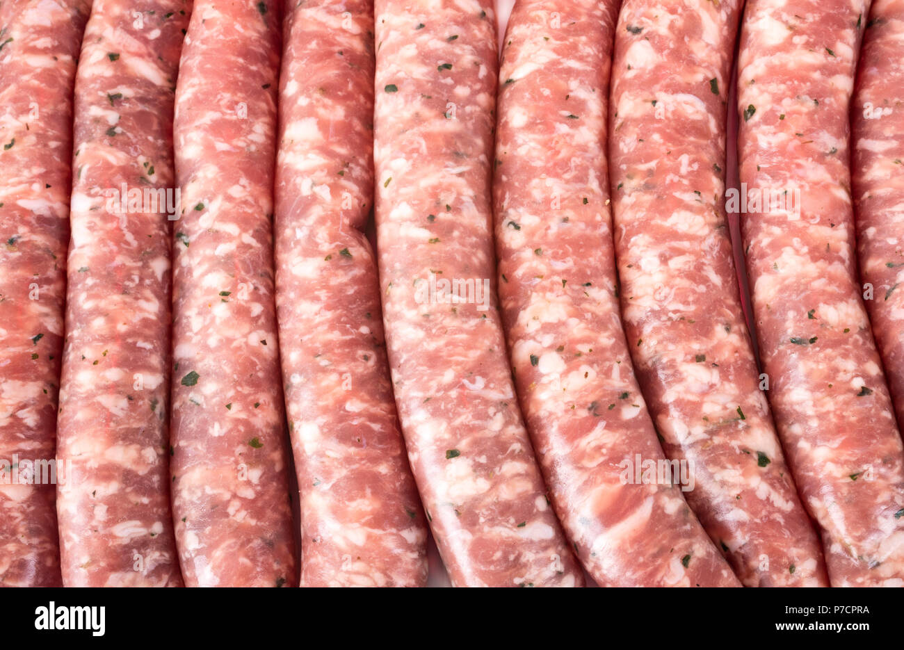 pork sausage in front of white background Stock Photo - Alamy