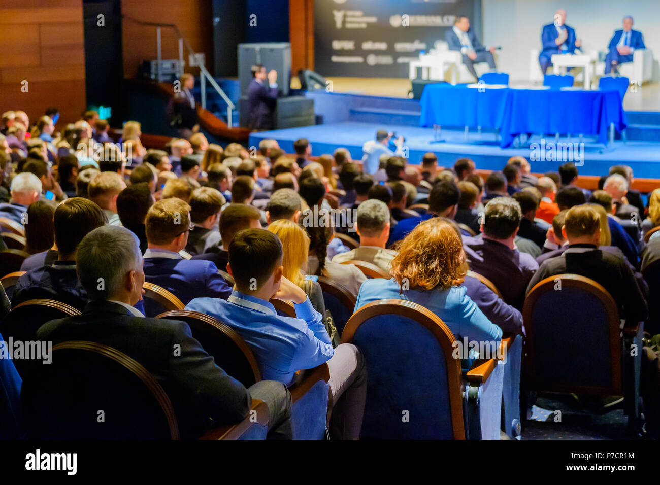 People attend business conference in the congress hall Stock Photo - Alamy