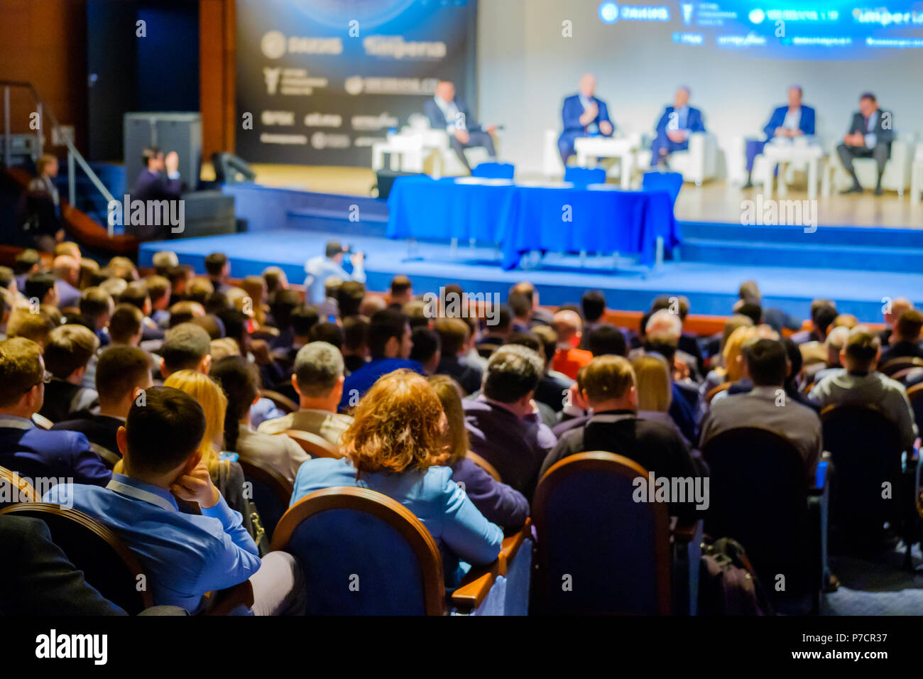 People attend business conference in the congress hall Stock Photo - Alamy
