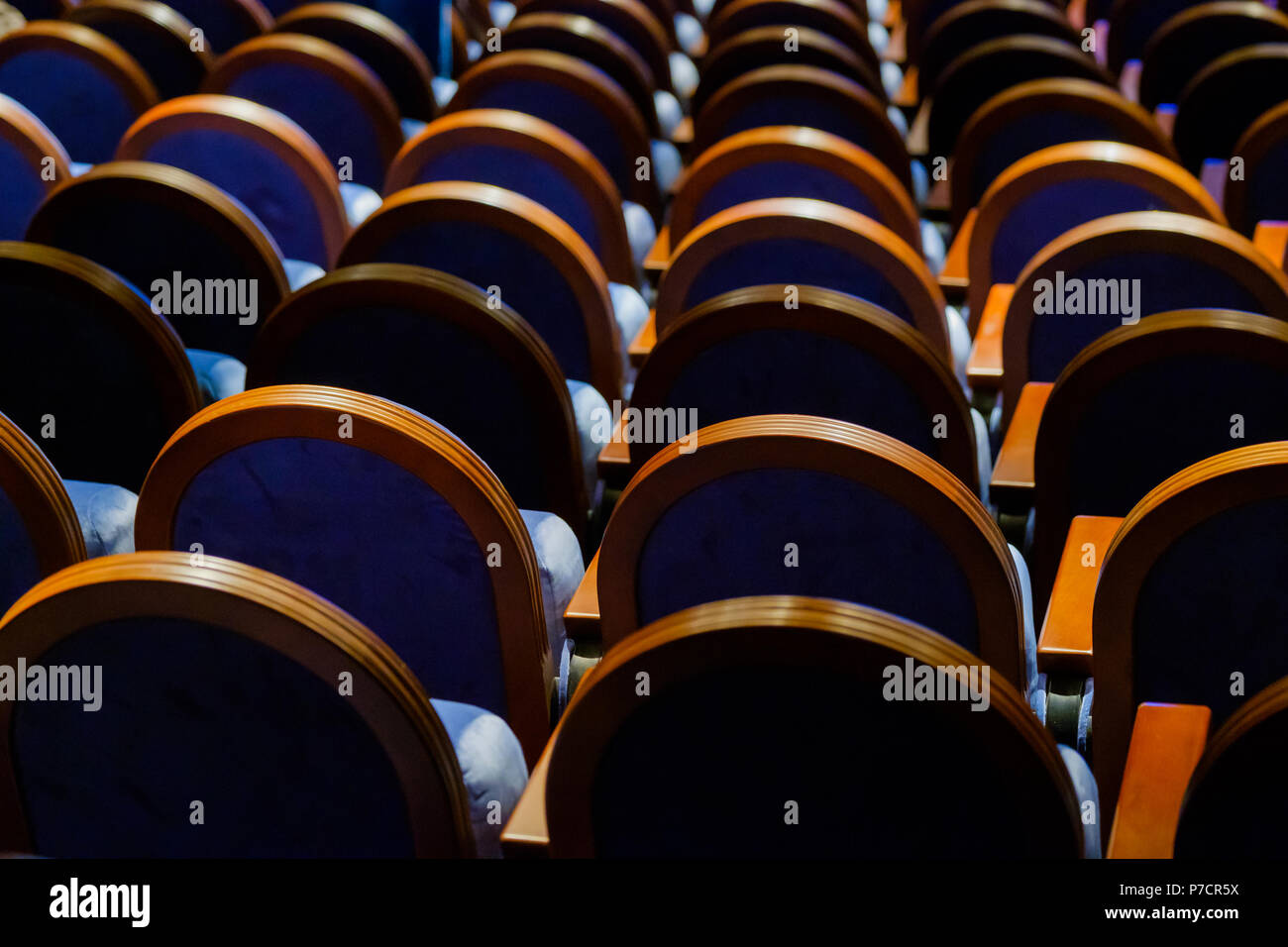 Chairs in the row at the big hall Stock Photo - Alamy