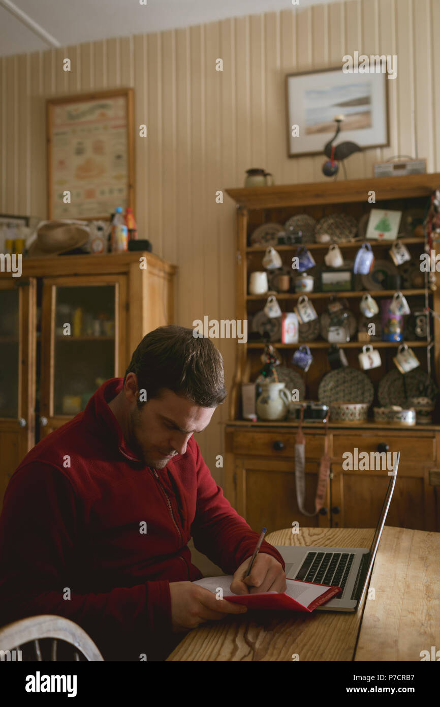 Man writing book hi-res stock photography and images - Alamy