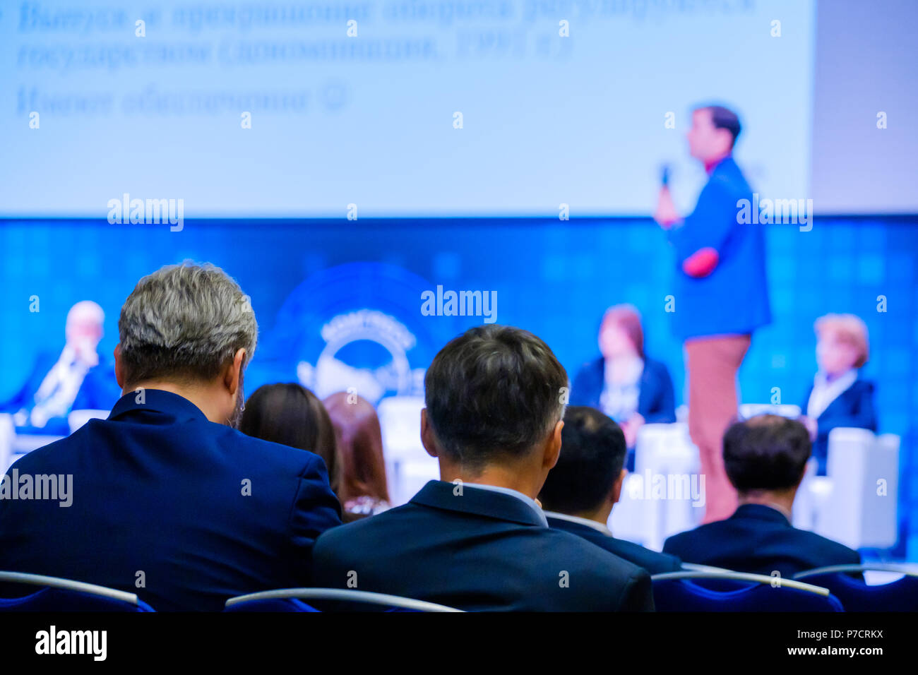 People attend business conference in the congress hall Stock Photo - Alamy