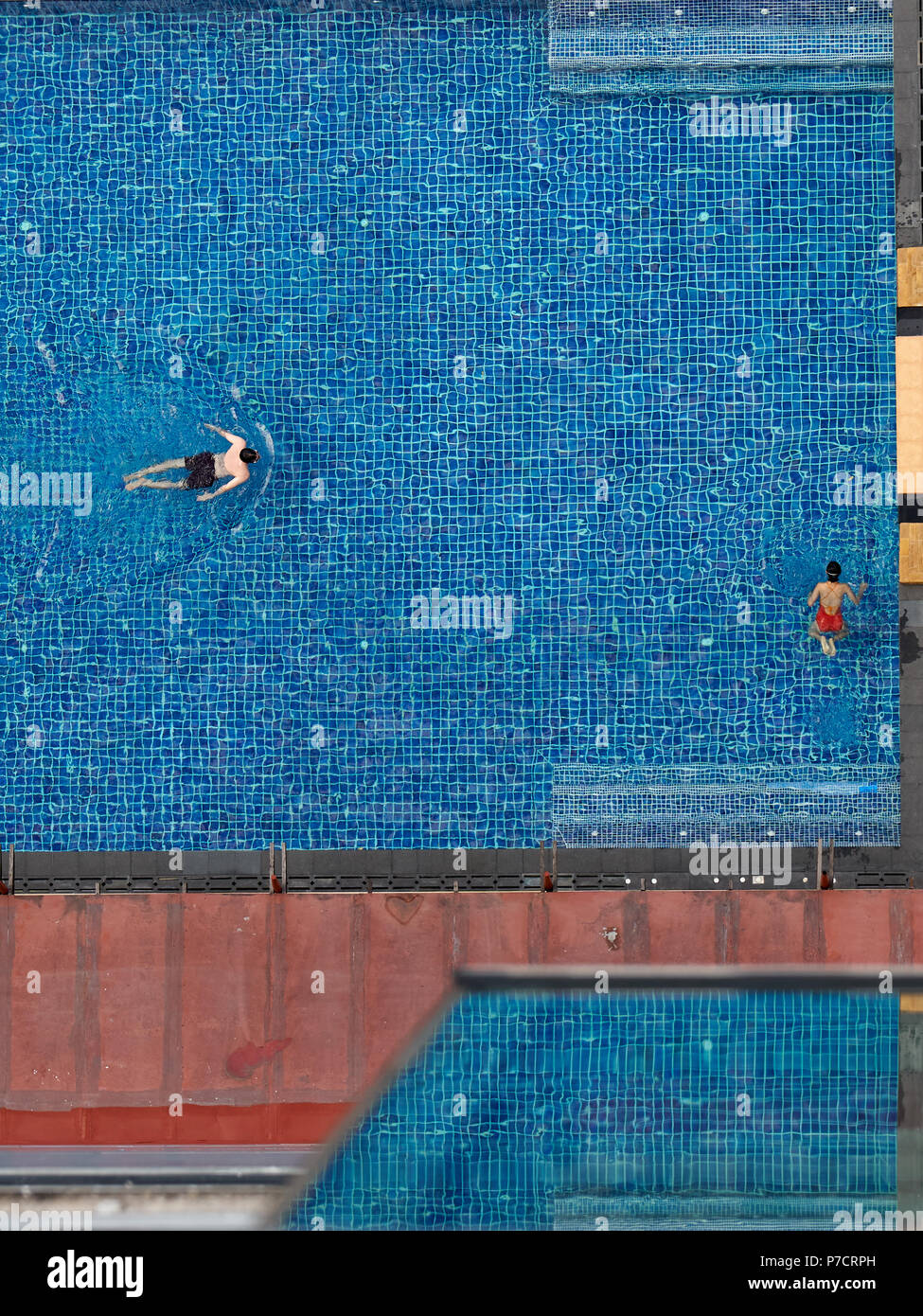 watching 2 swimmers from above Stock Photo - Alamy