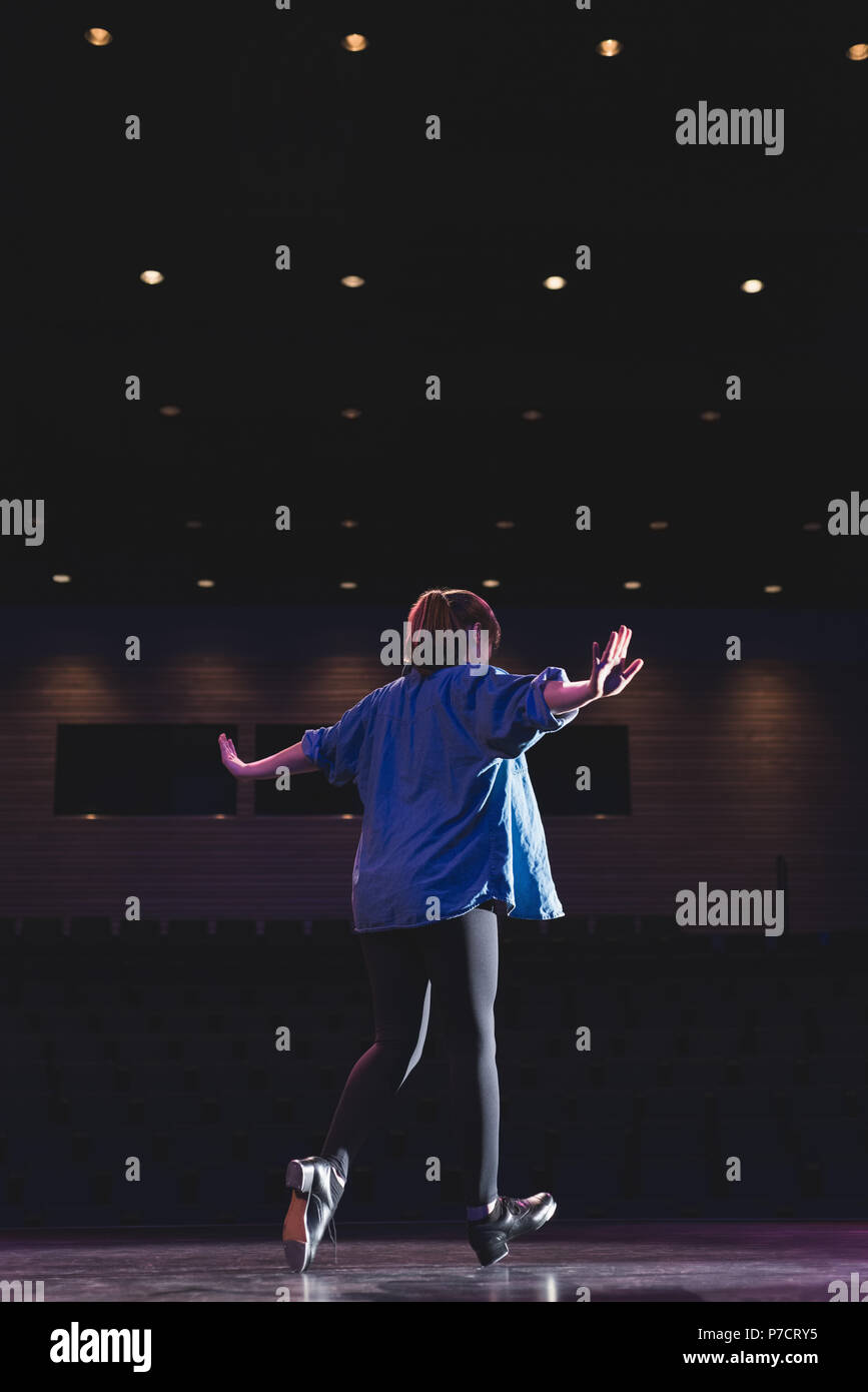 Woman dancing on stage Stock Photo - Alamy