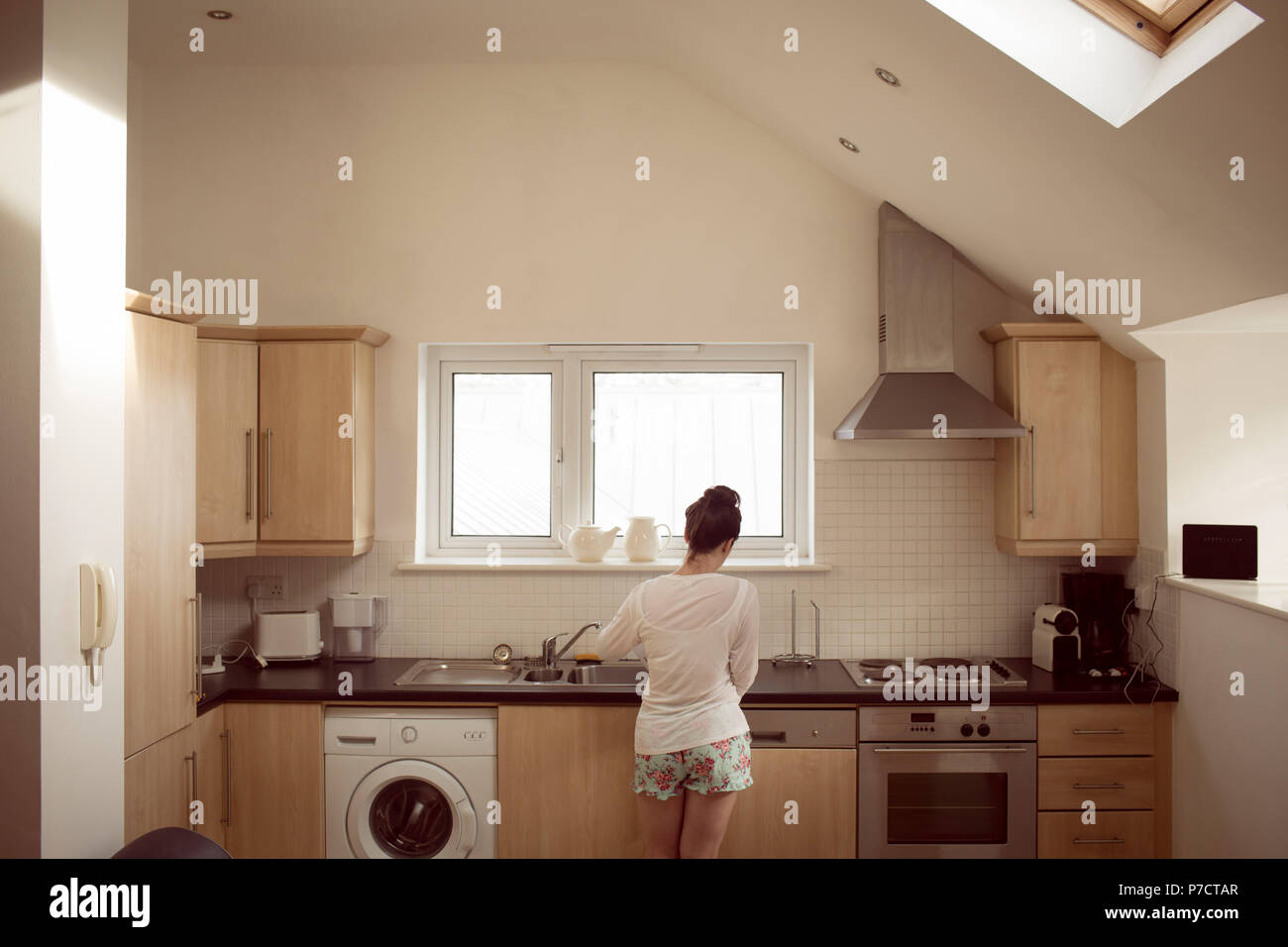Kitchen drawer woman hi-res stock photography and images - Alamy