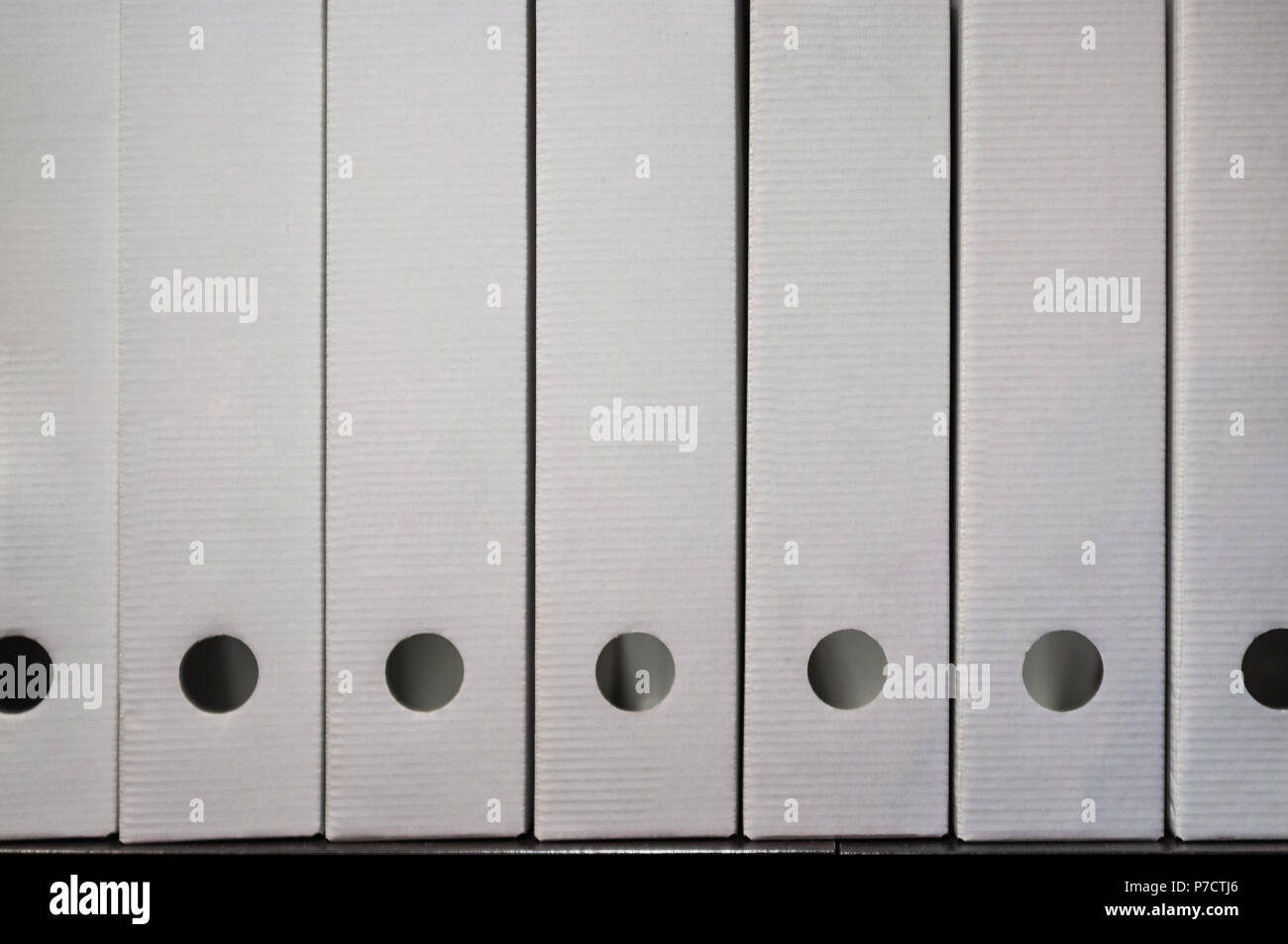White document archive folders stacked on a shelf with copy space Stock ...