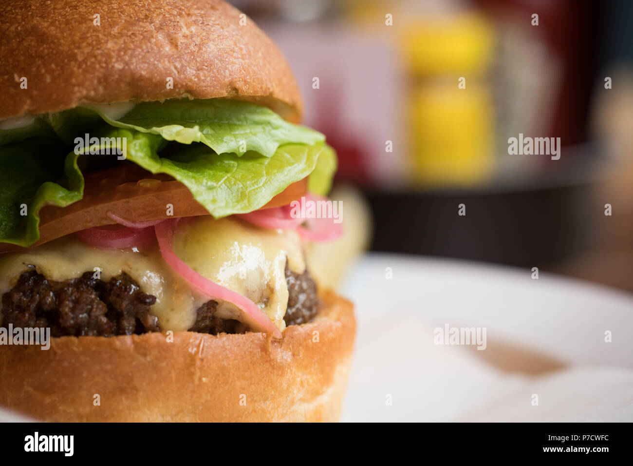 Burger served in a plate Stock Photo - Alamy