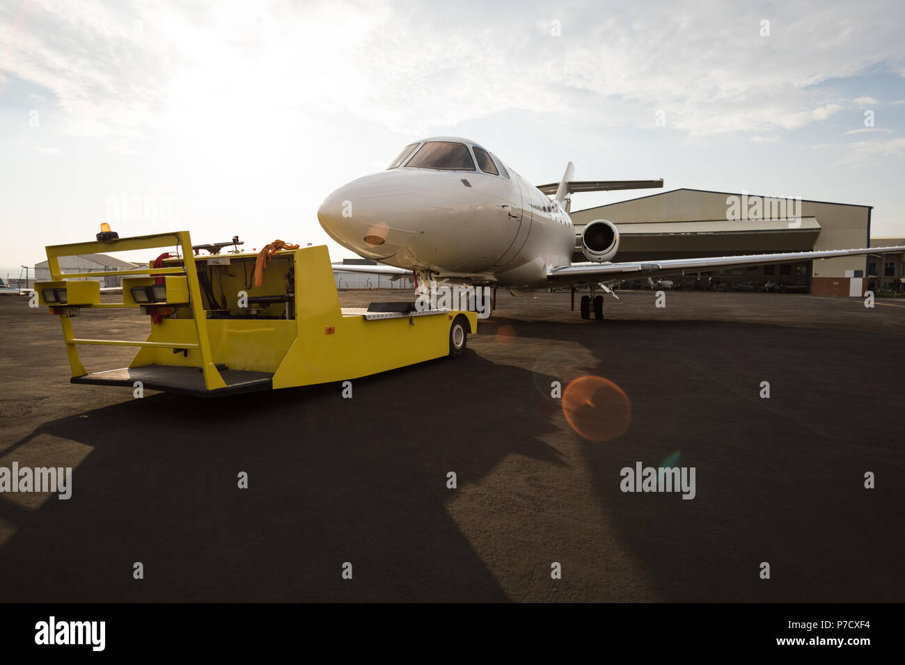 Private jet with trolley at terminal Stock Photo - Alamy