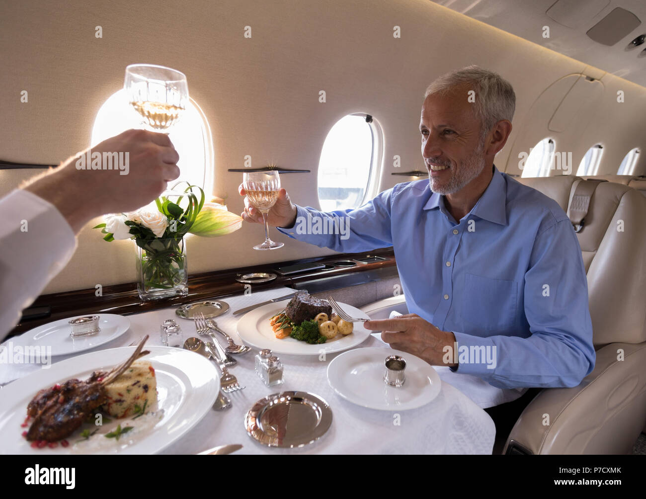 Private jet champagne hi-res stock photography and images - Alamy