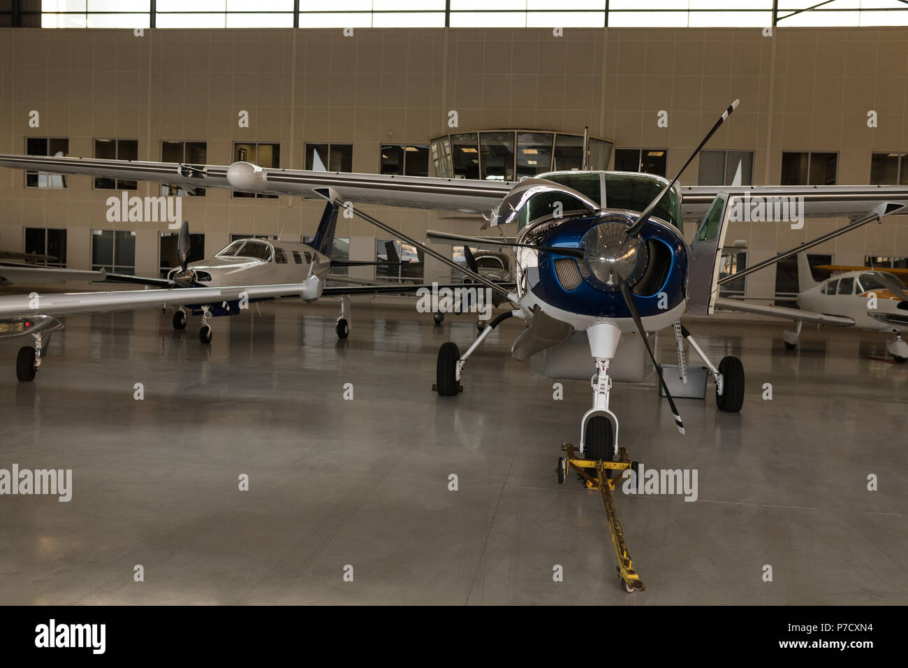 Private jet in hangar Stock Photo - Alamy
