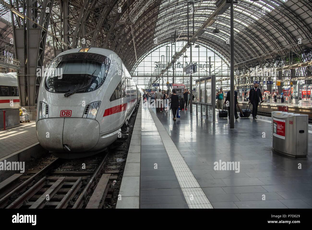 Passengers leave a ICE High speed train at Frankfurt am Main Central ...