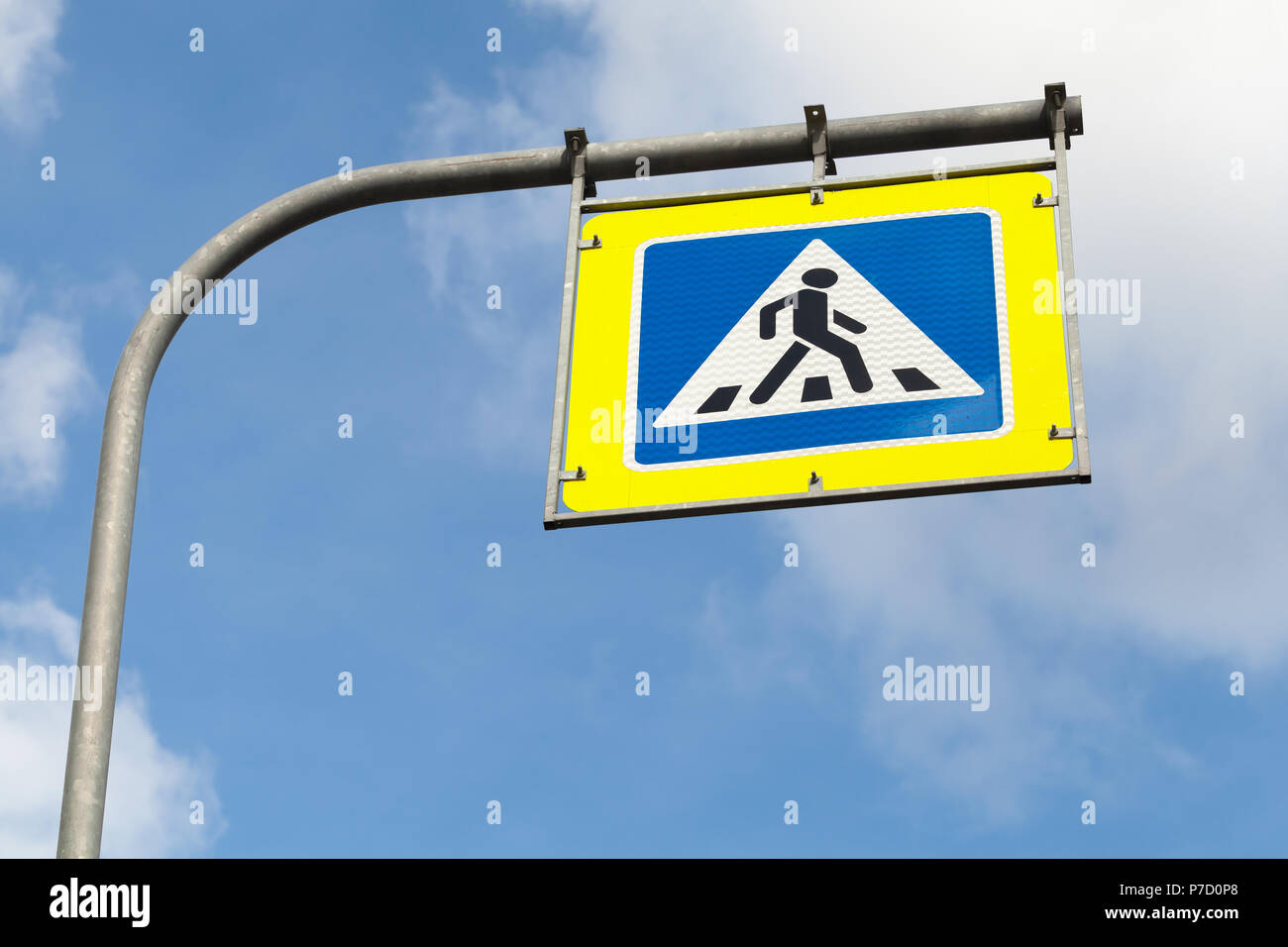Pedestrian crossing. Square blue and white road sign with yellow frame ...
