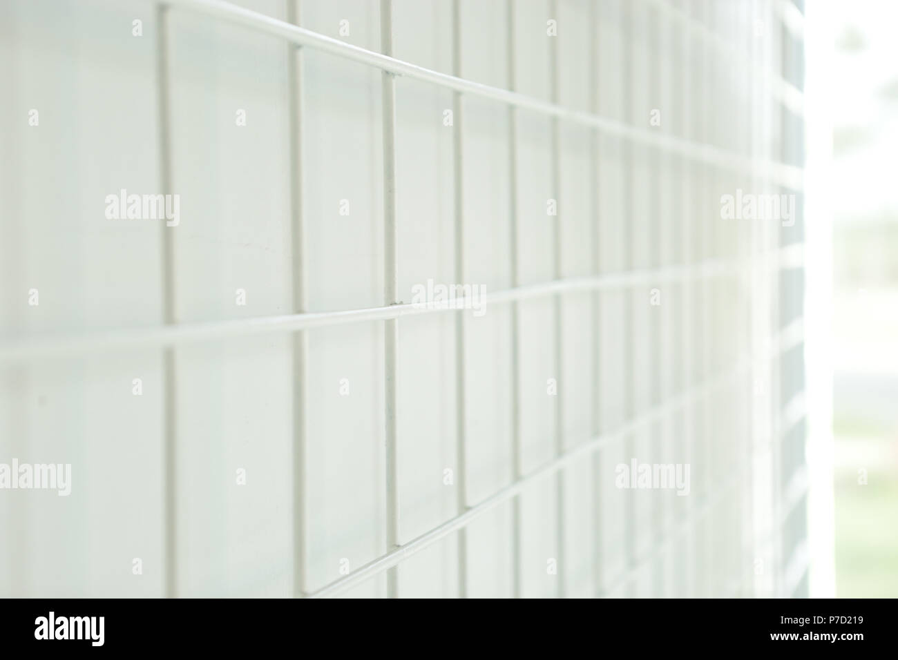 a creative white wall decorate with square pattern grate Stock Photo ...