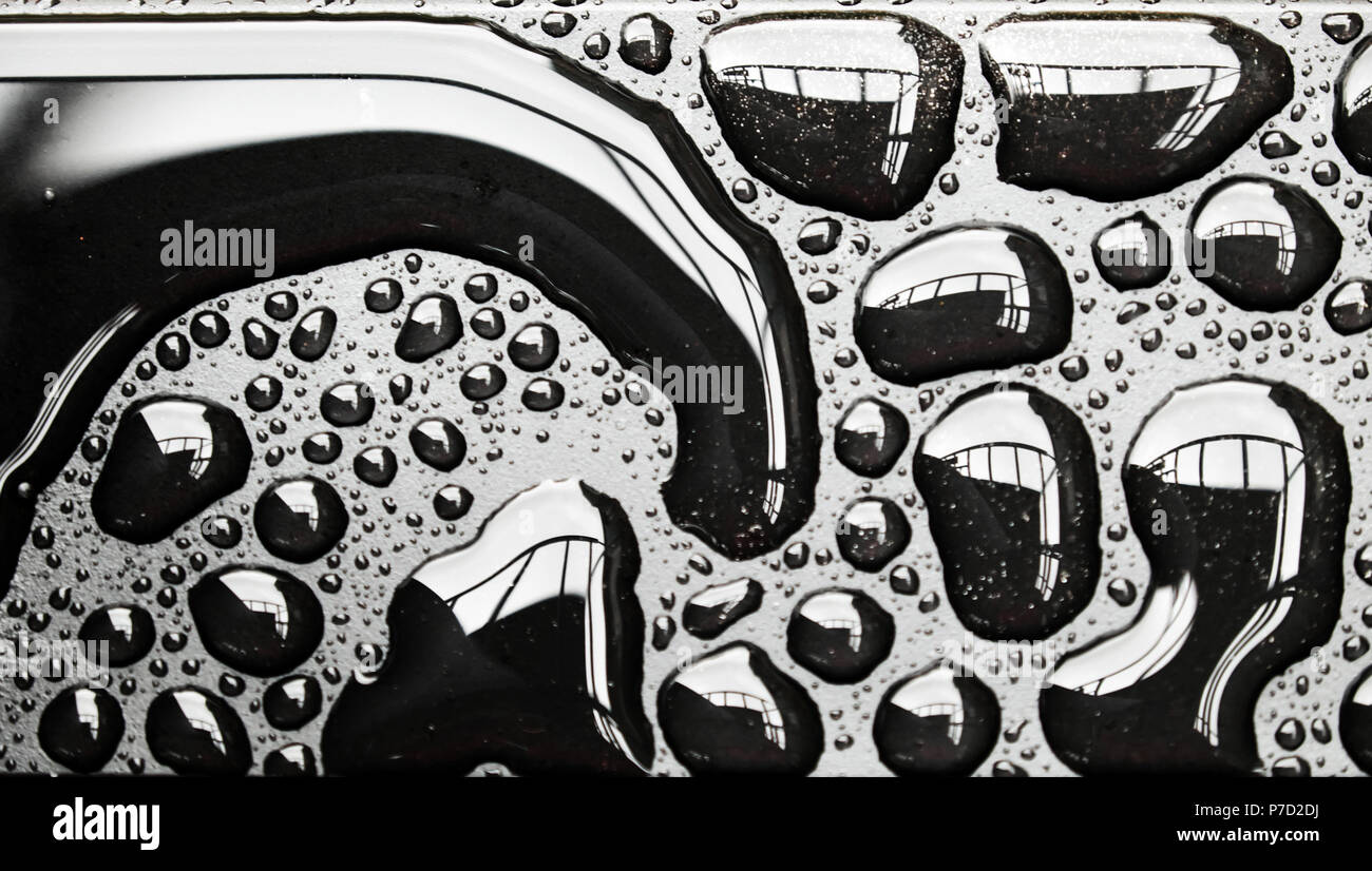 Amazing shape of rain drop on steel surface after rainy day, water ...