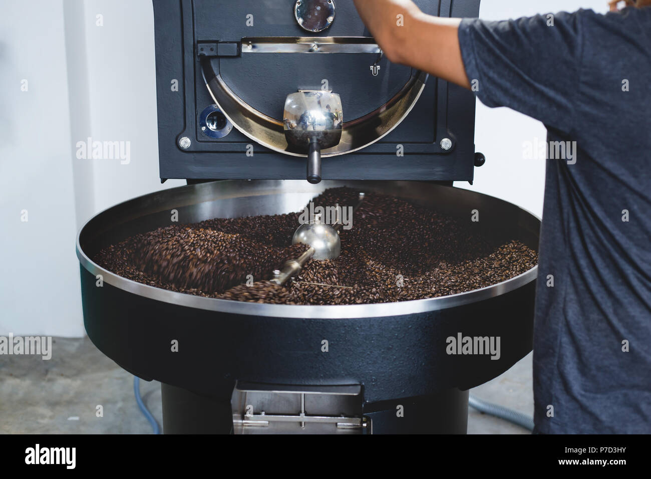 Working roasting coffee machine hi-res stock photography and images - Alamy
