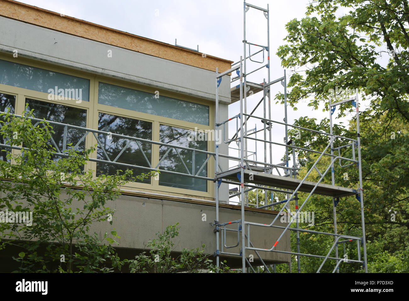 Repair of the building, scaffolding Stock Photo - Alamy