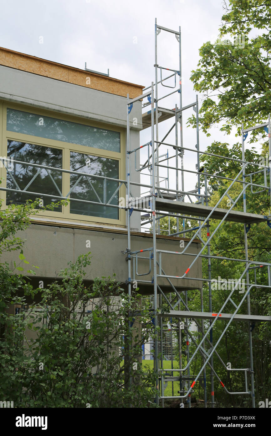 Repair of the building, scaffolding Stock Photo - Alamy
