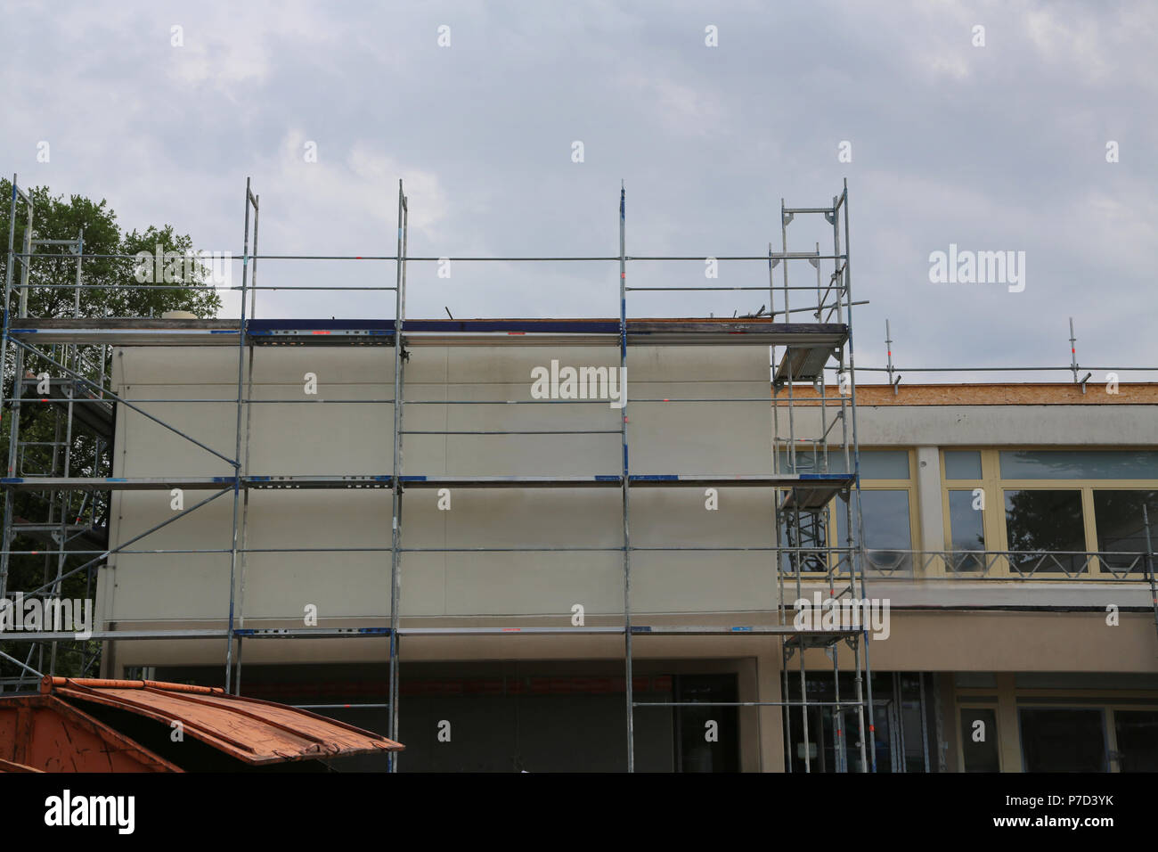 Repair of the building, scaffolding Stock Photo - Alamy