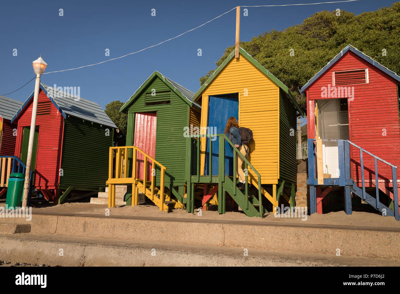 Young woman beach hut hi-res stock photography and images - Alamy