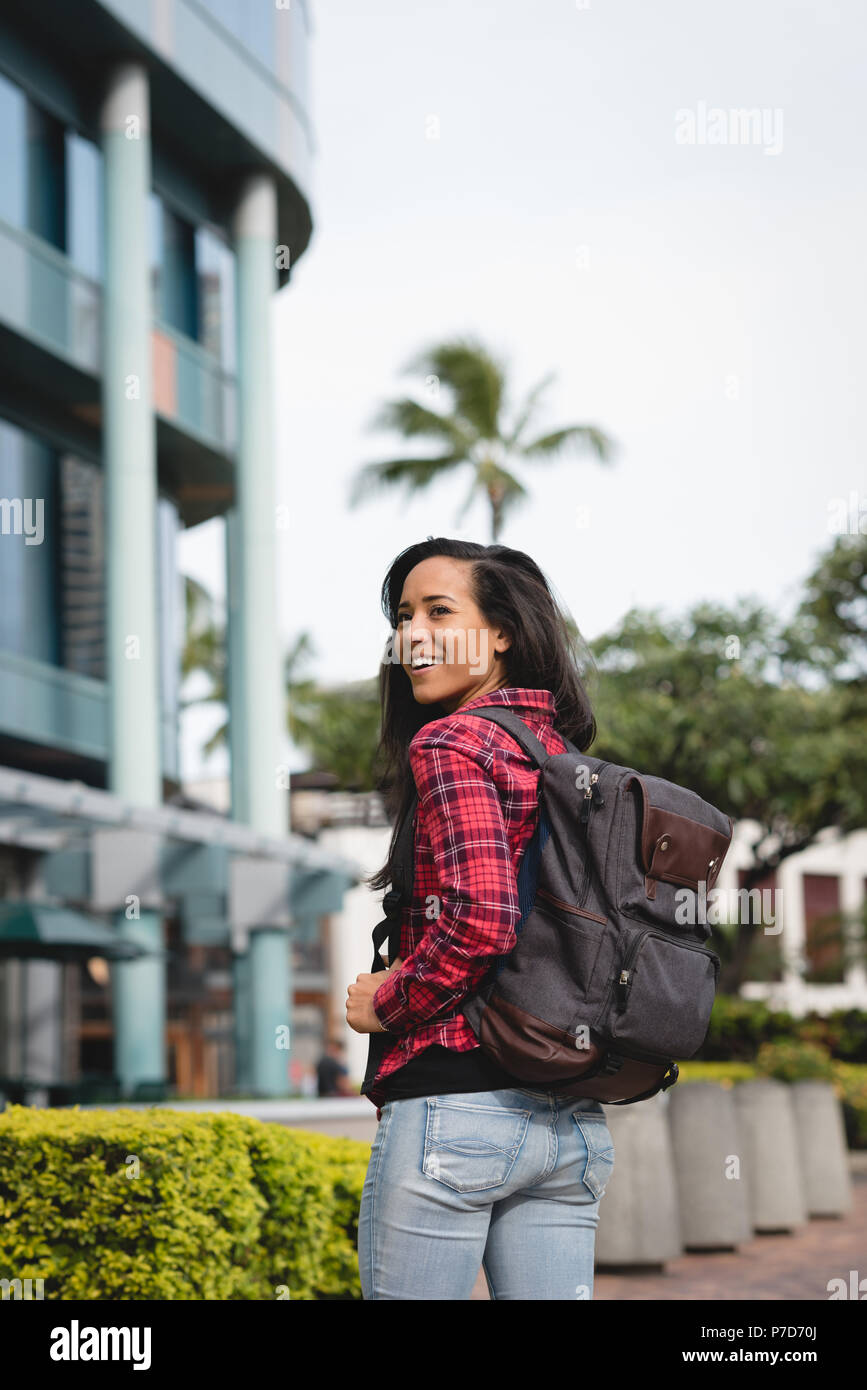 Beautiful woman backpack standing outdoors hi-res stock photography and ...