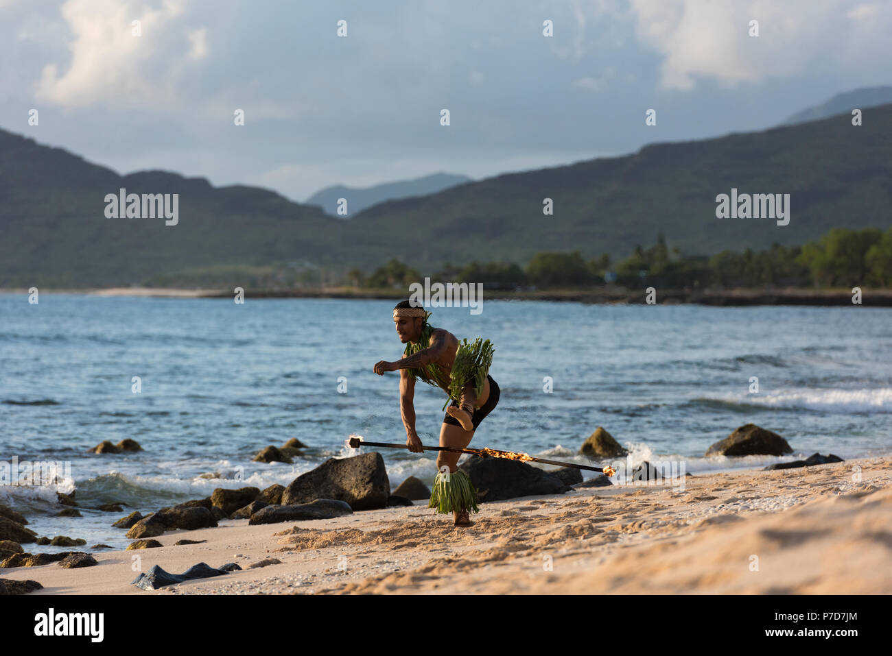 Male fire dancer performing with fire levi sticks Stock Photo - Alamy