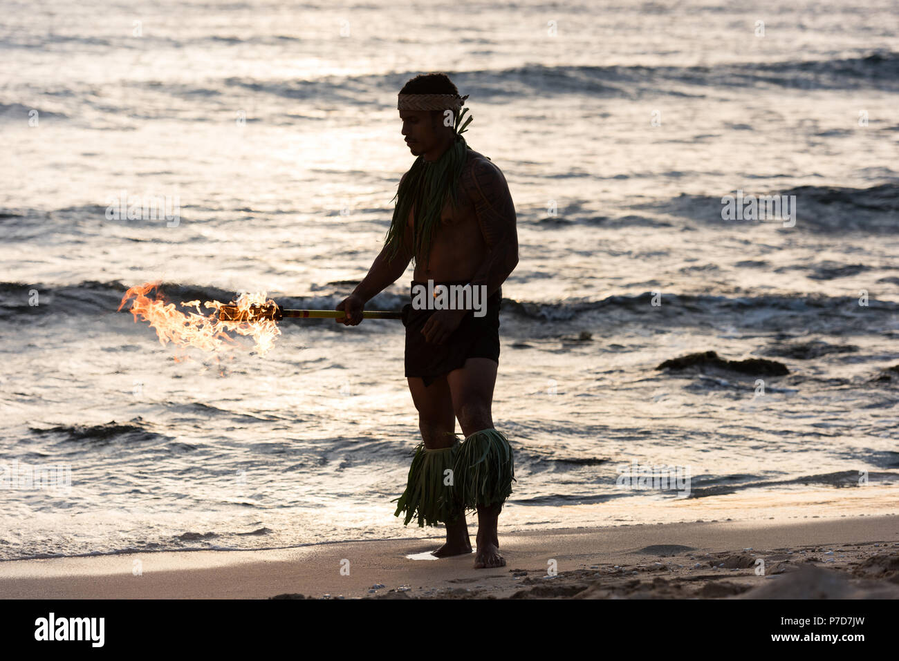Male fire dancer performing with fire levi stick Stock Photo - Alamy