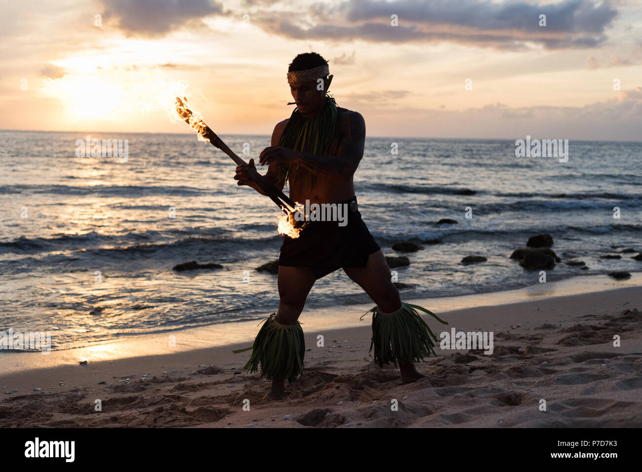 Male fire dancer performing with fire levi stick Stock Photo - Alamy