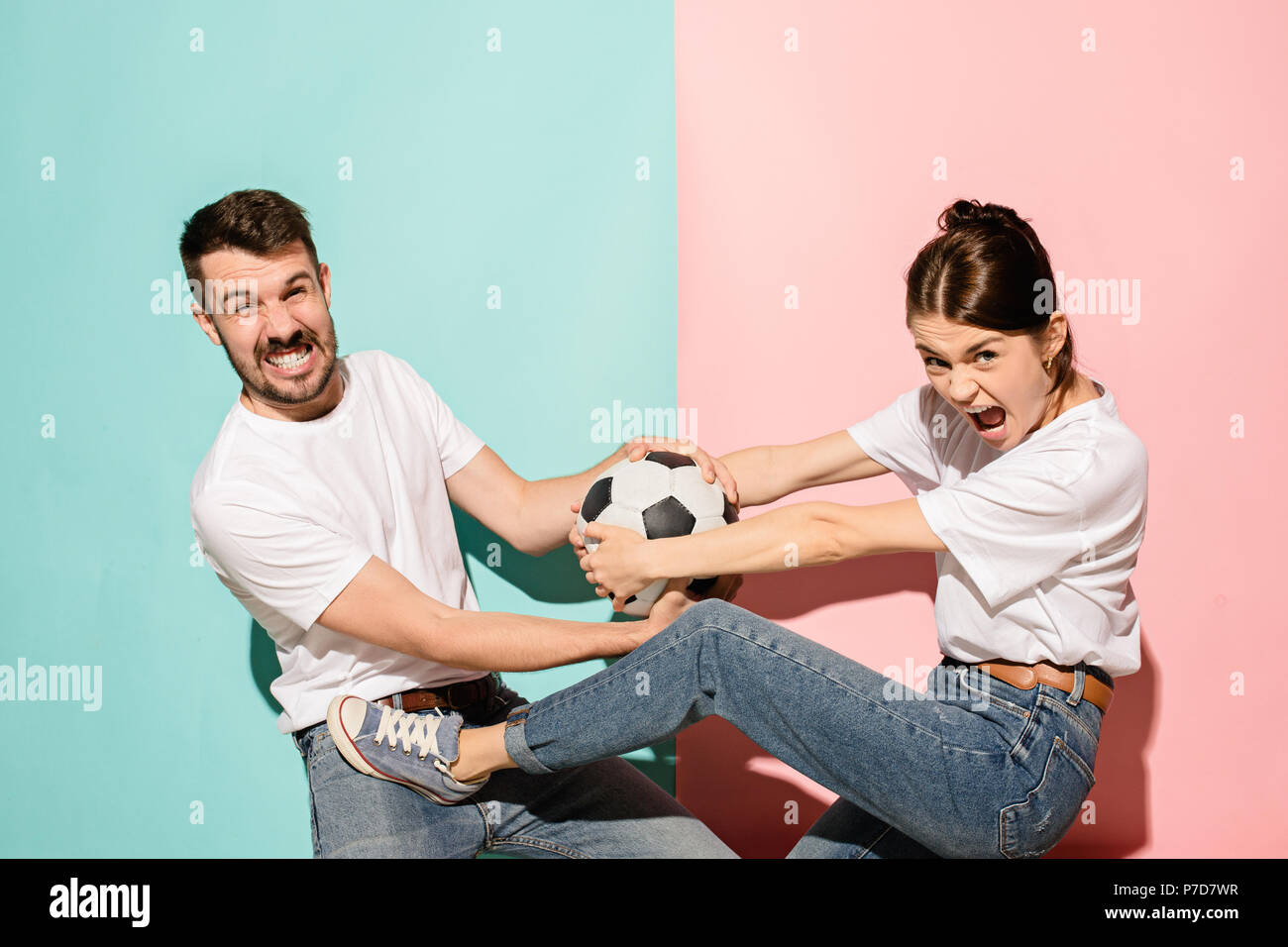 The unhappy and angry fans on colored blue and pink background Stock ...