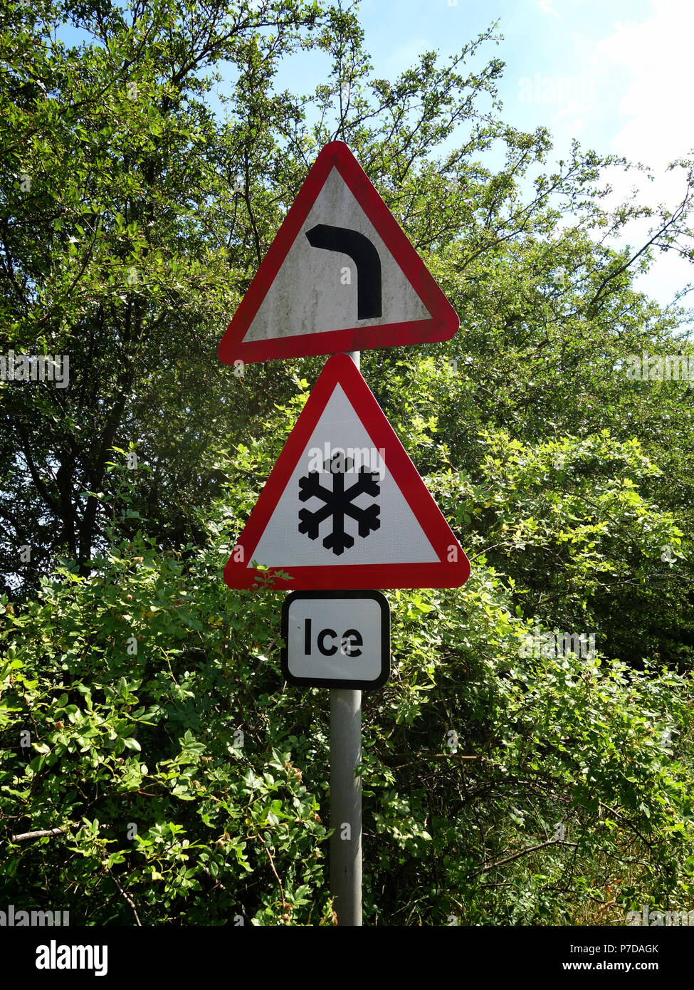 Warning Ice Sign that is mounted permanently on a pole at the side of a ...