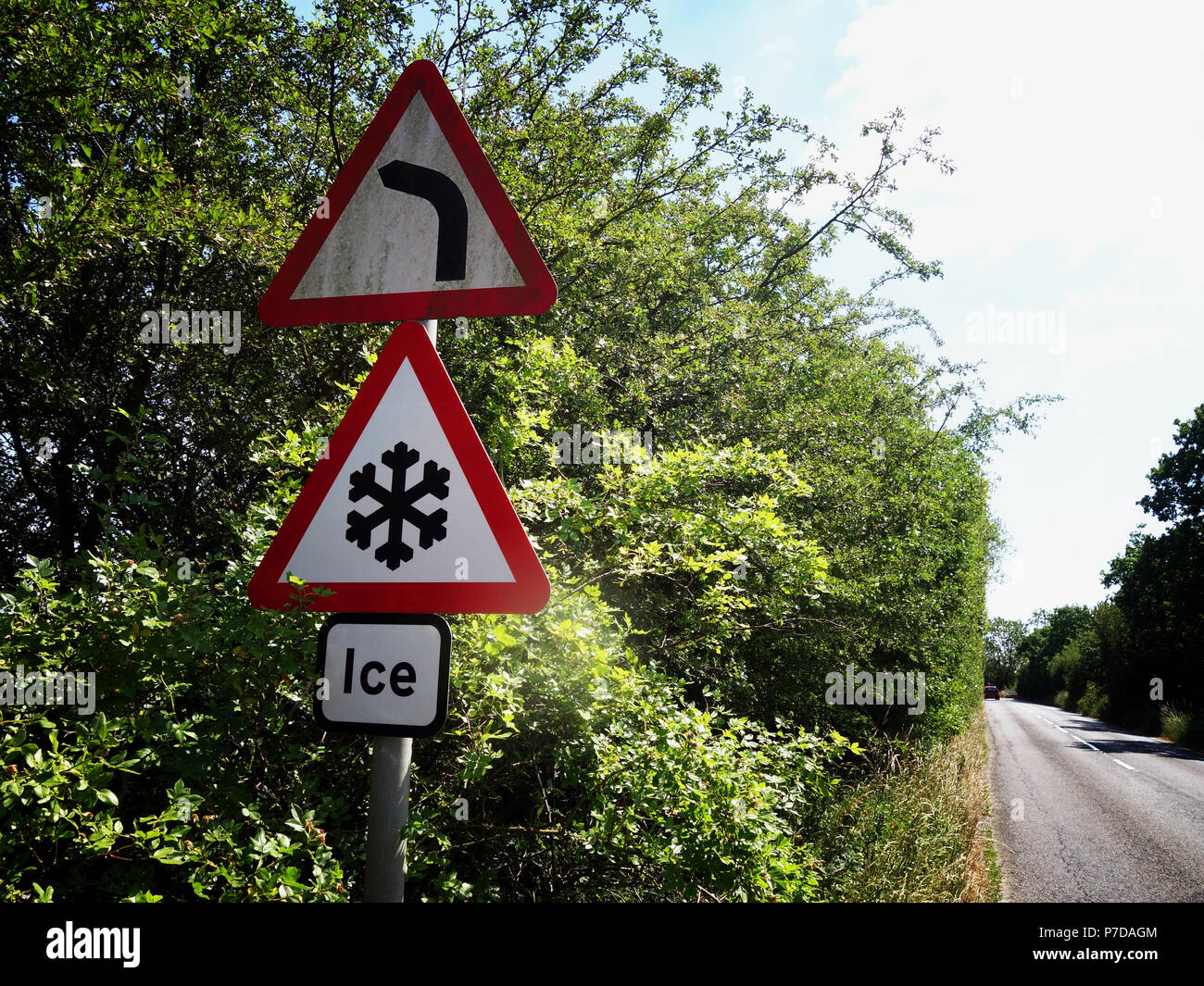 Warning Ice Sign that is mounted permanently on a pole at the side of a ...