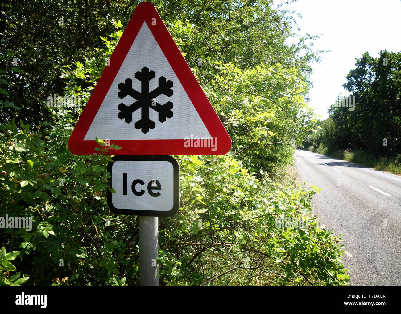 Warning Ice Sign that is mounted permanently on a pole at the side of a ...