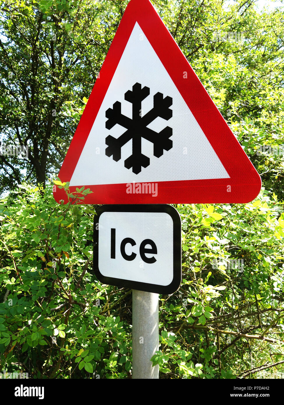 Warning Ice Sign that is mounted permanently on a pole at the side of a ...