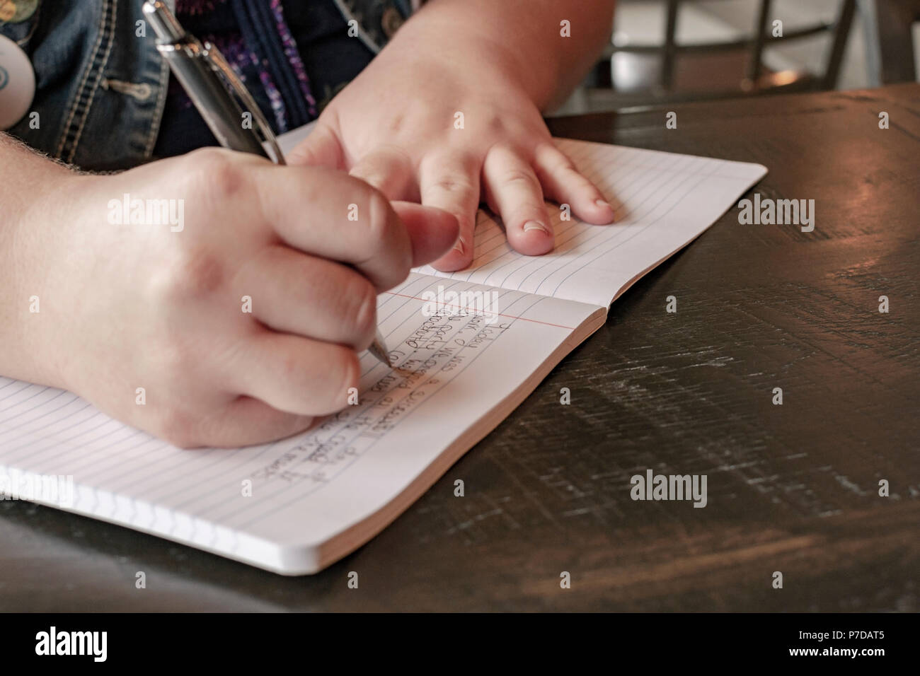Woman take notes in notebook hi-res stock photography and images - Alamy