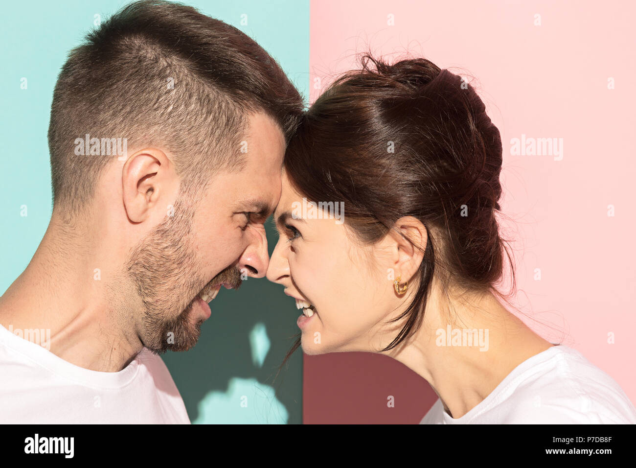 attractive angry couple fighting and shouting at each other Stock Photo ...
