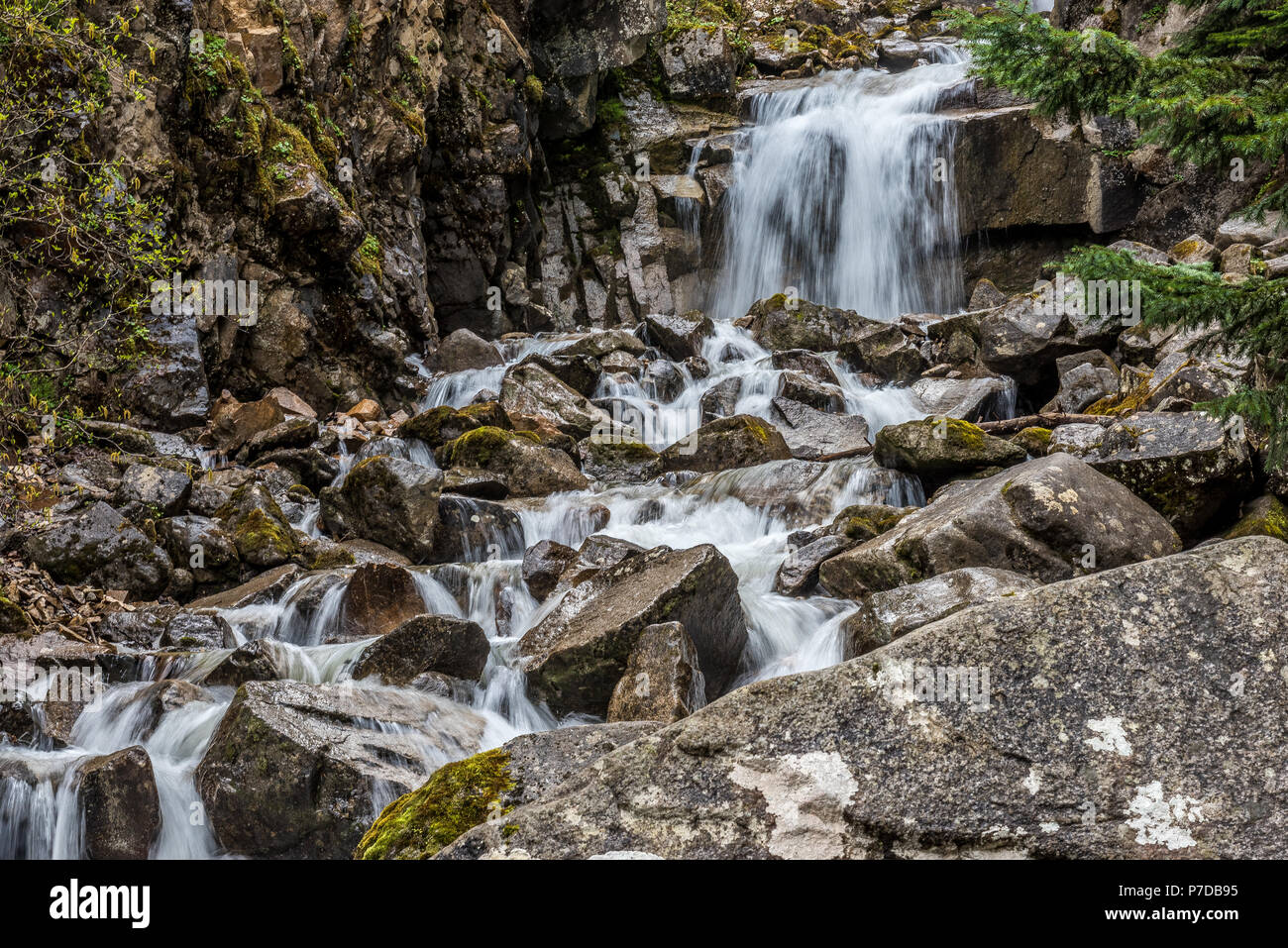 A waterfall in the woods from melting glacier ice Stock Photo - Alamy