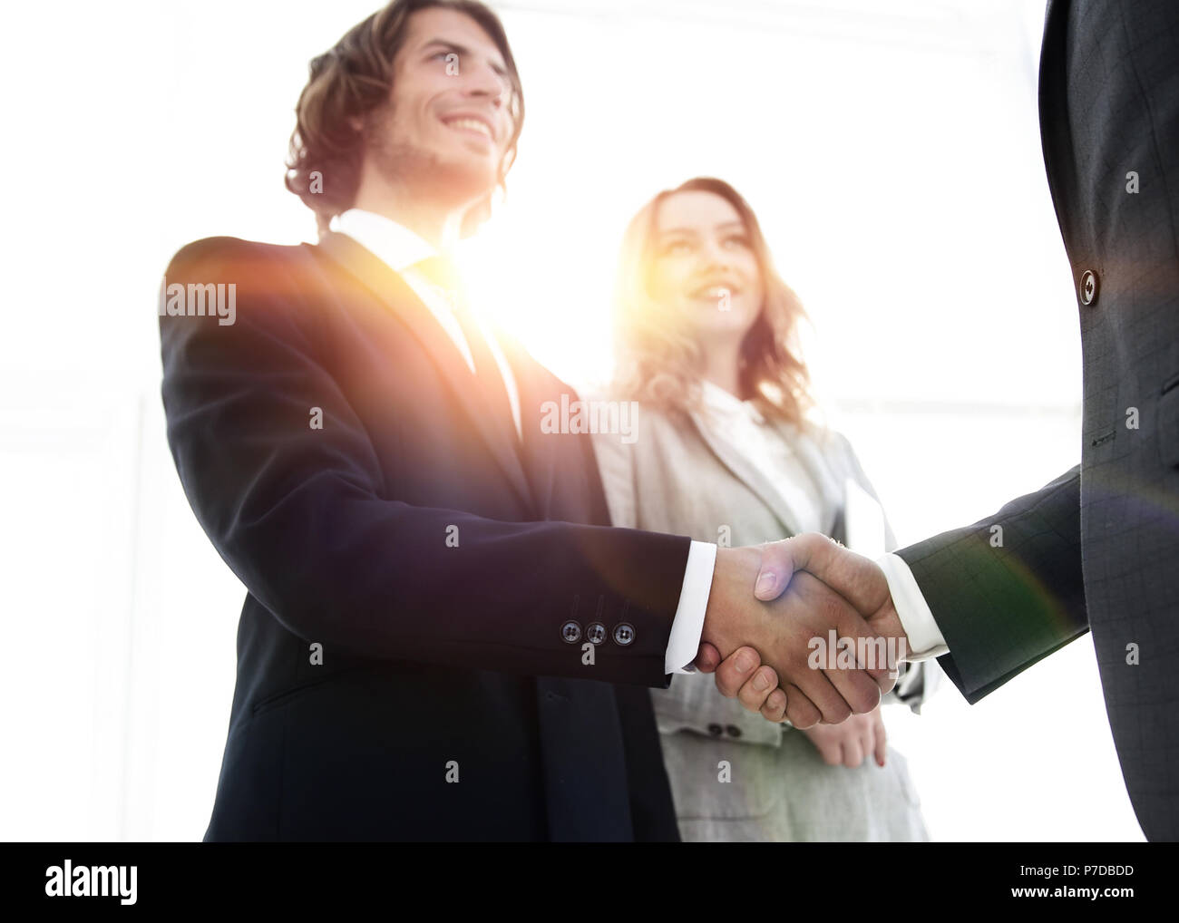 Photo of handshake of two happy businessmen Stock Photo - Alamy