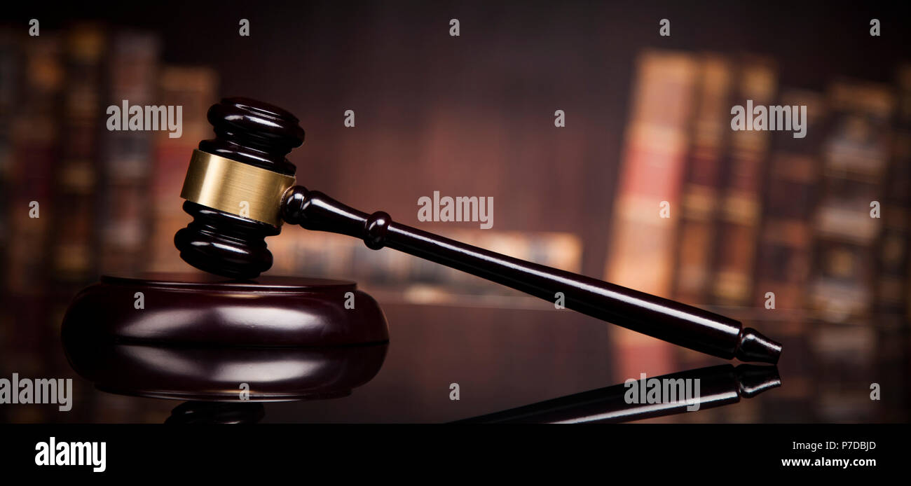 law theme, mallet of the judge, justice scale, books, wooden desk Stock Photo - Alamy