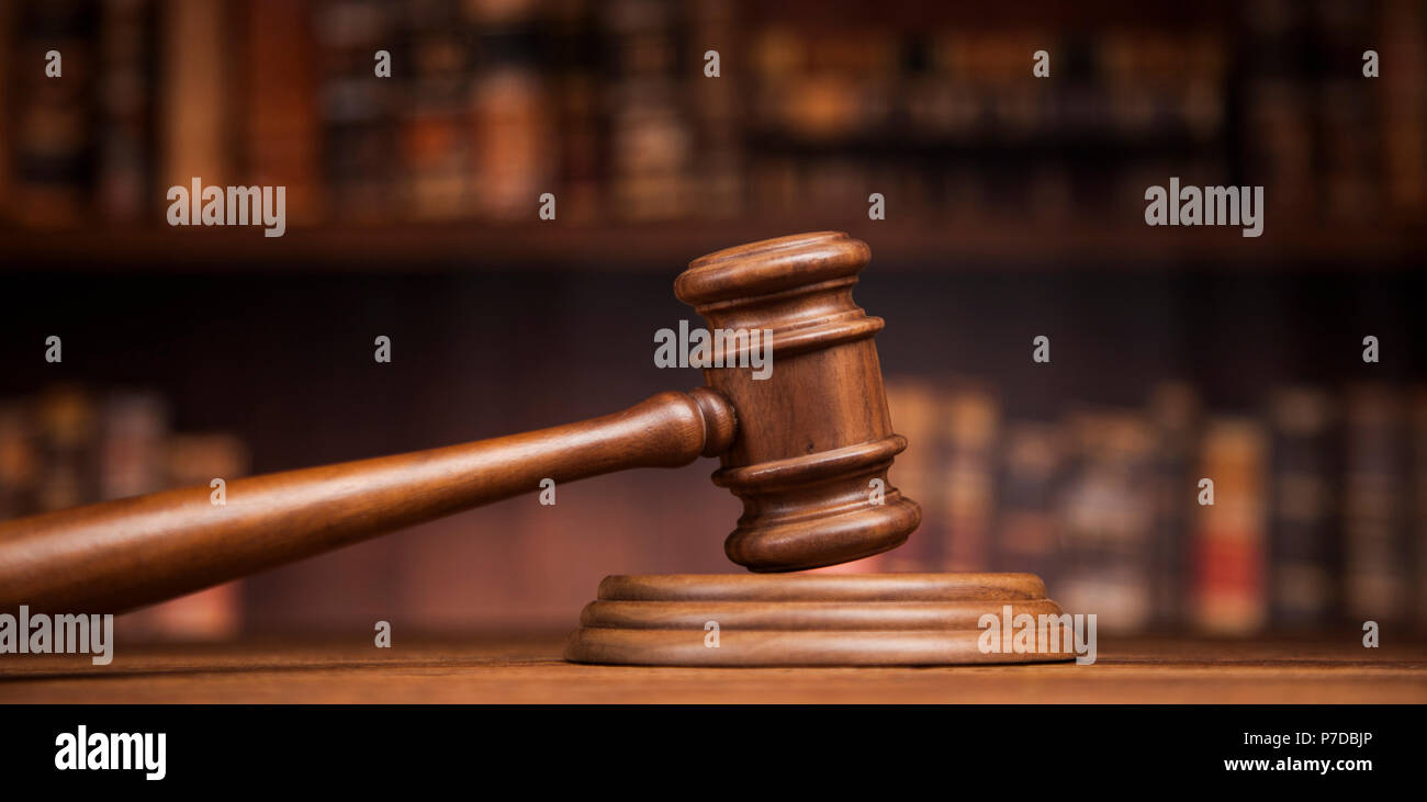 law theme, mallet of the judge, justice scale, books, wooden desk Stock Photo - Alamy