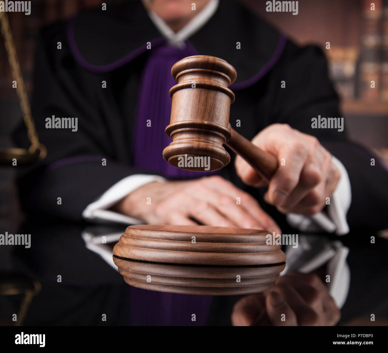 Judge, male judge in a courtroom striking the gavel Stock Photo - Alamy