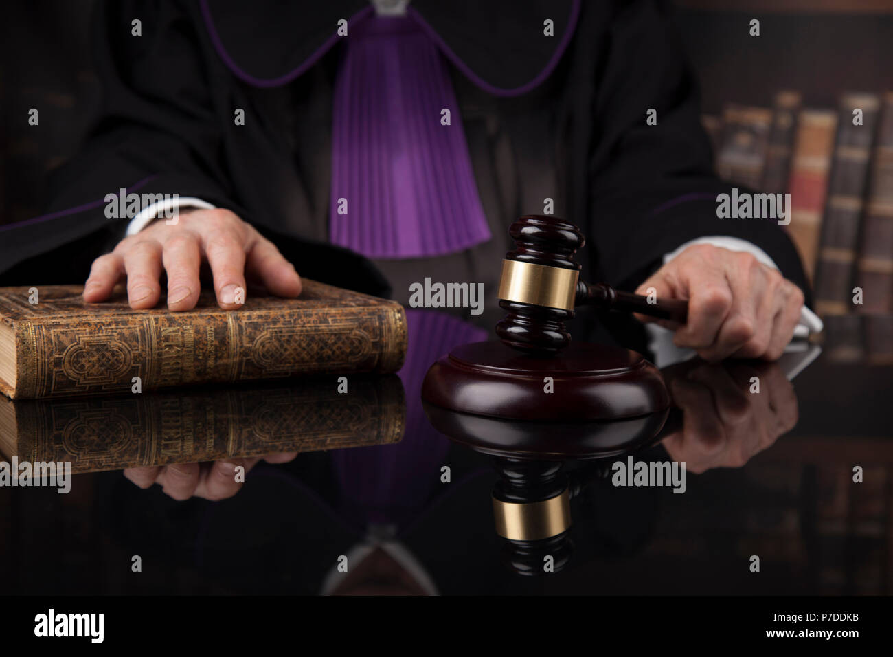 Judge, male judge in a courtroom striking the gavel Stock Photo - Alamy