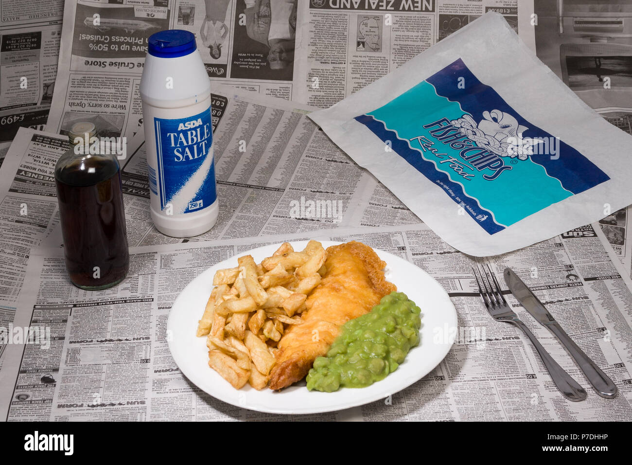 Newspaper fish and chips salt vinegar hi-res stock photography and ...