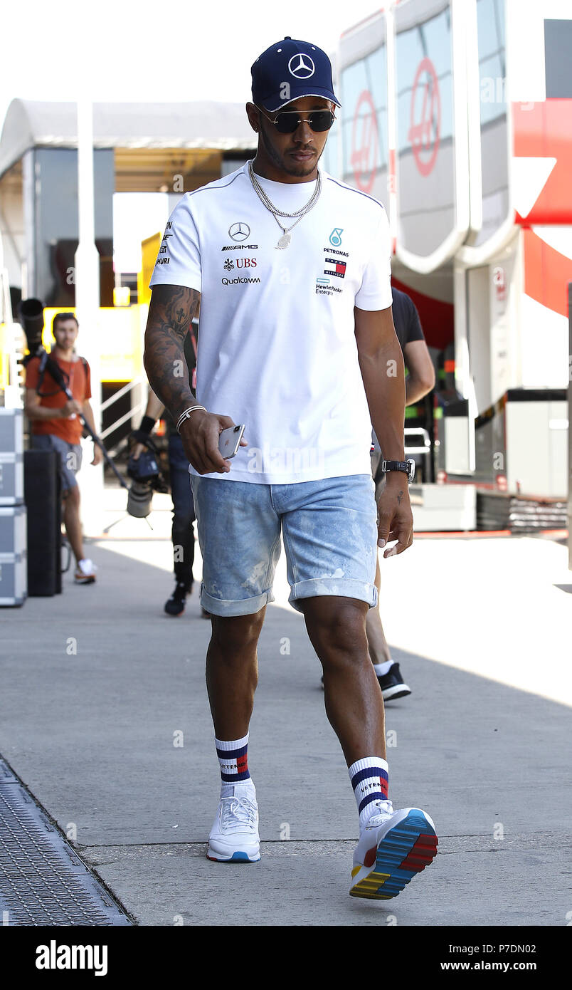 Mercedes driver lewis hamilton walks through paddock hi-res stock ...