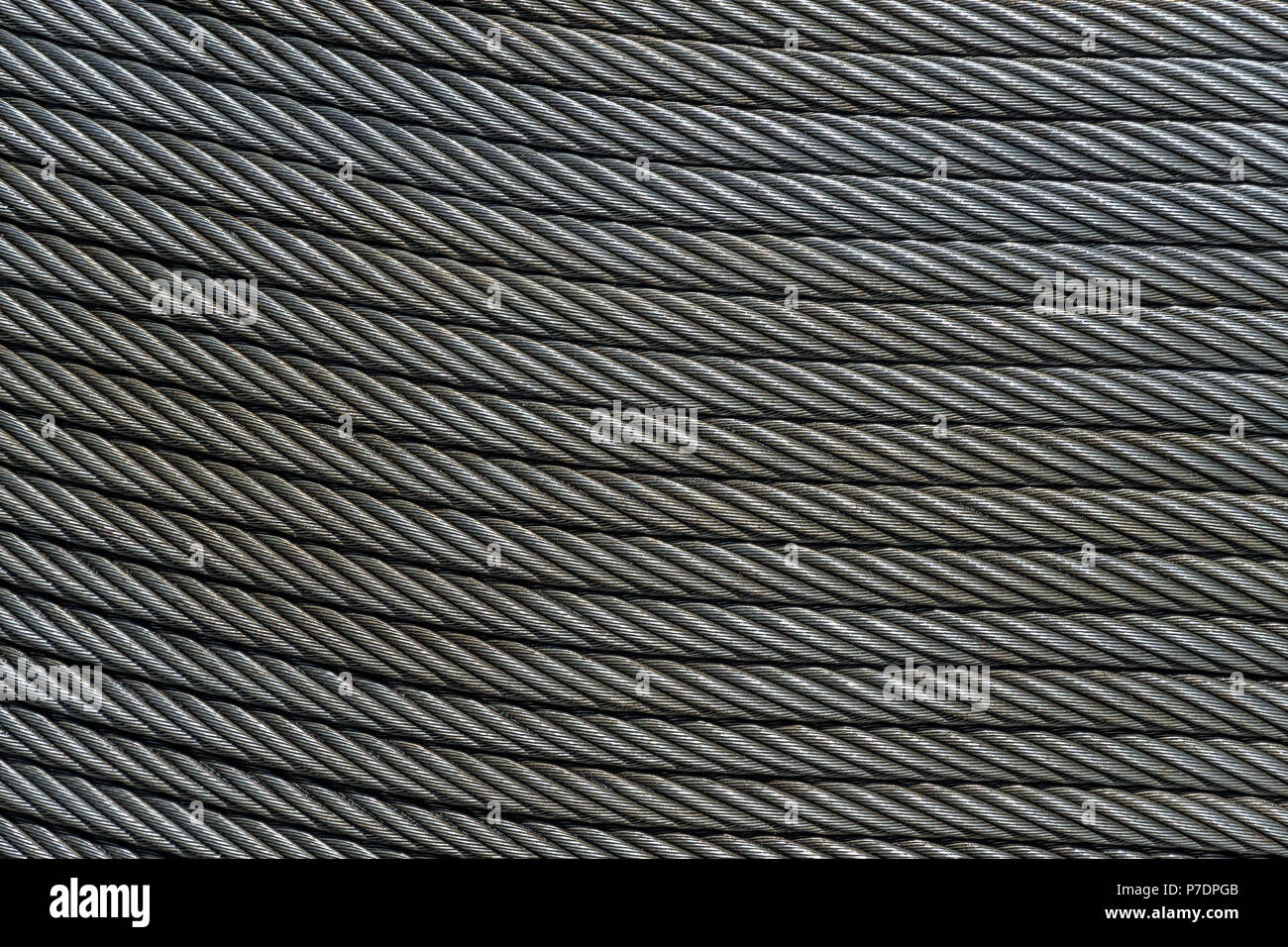 Pattern of a tightly folded new steel cable arranged in parallel in ...