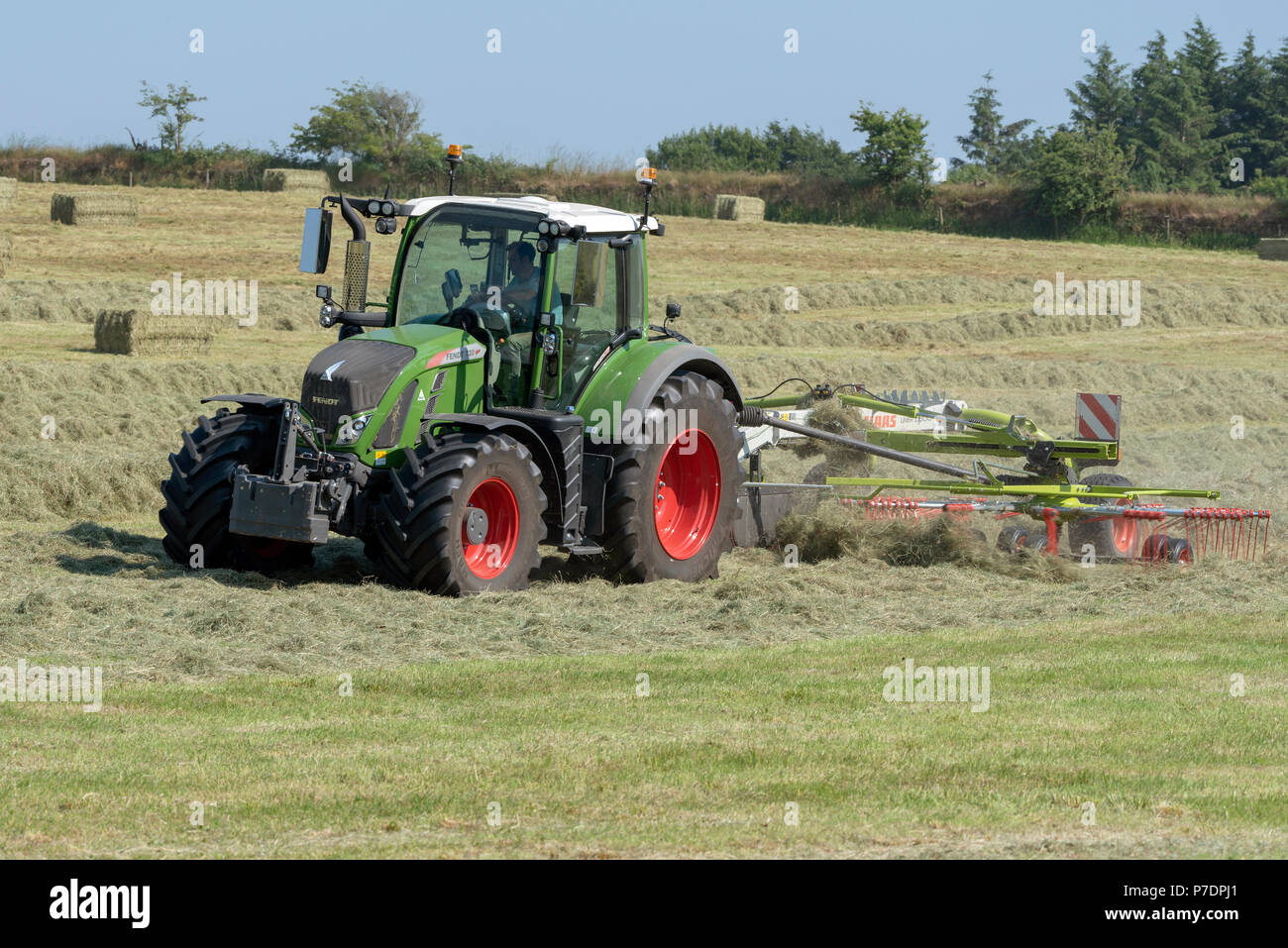 Dartmoor, Devon, England, UK Haymaking on a Devonshire farm using a ...