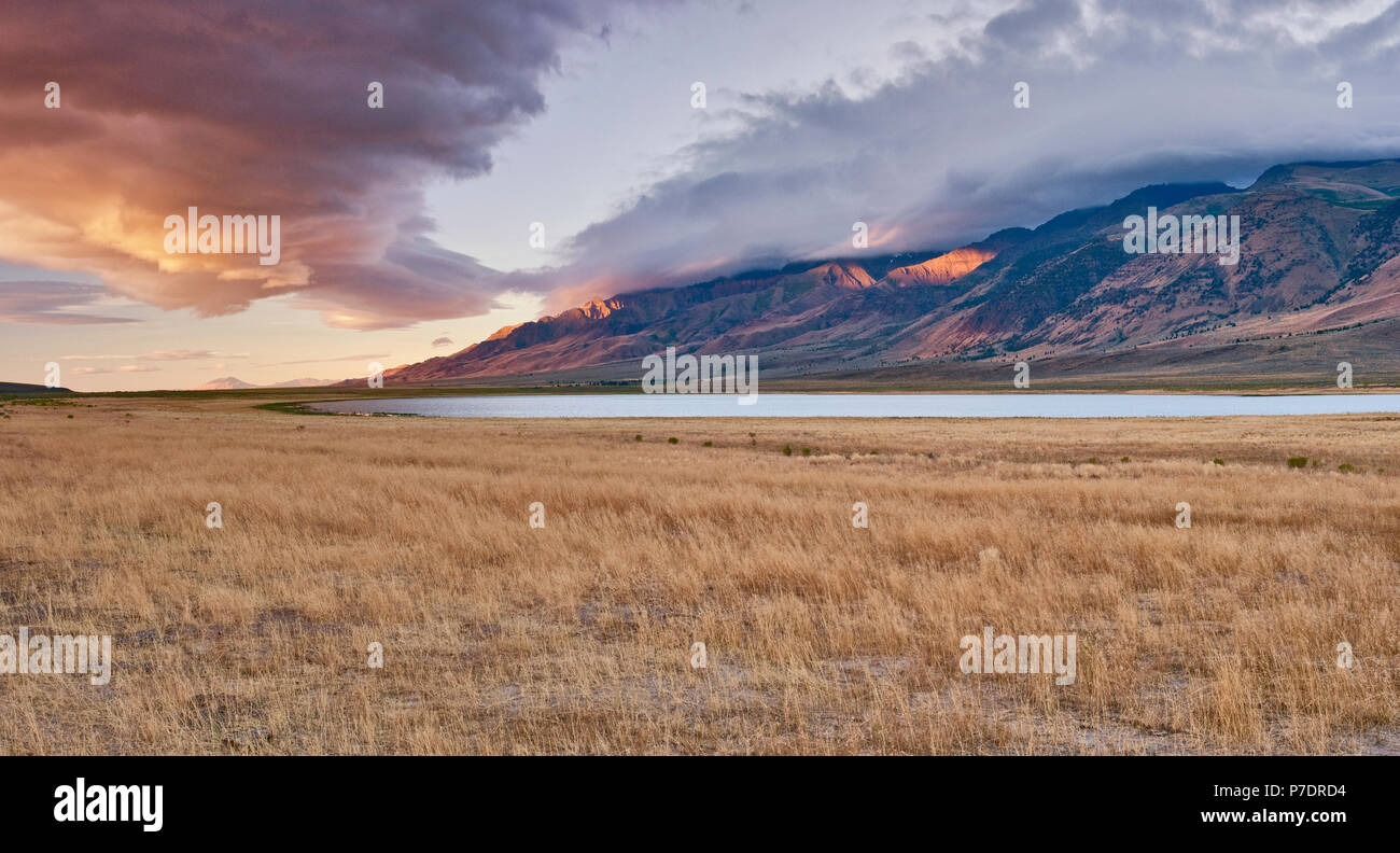 Big cloud in front of Steens Mountain, rising 5,000 feet above Mann ...