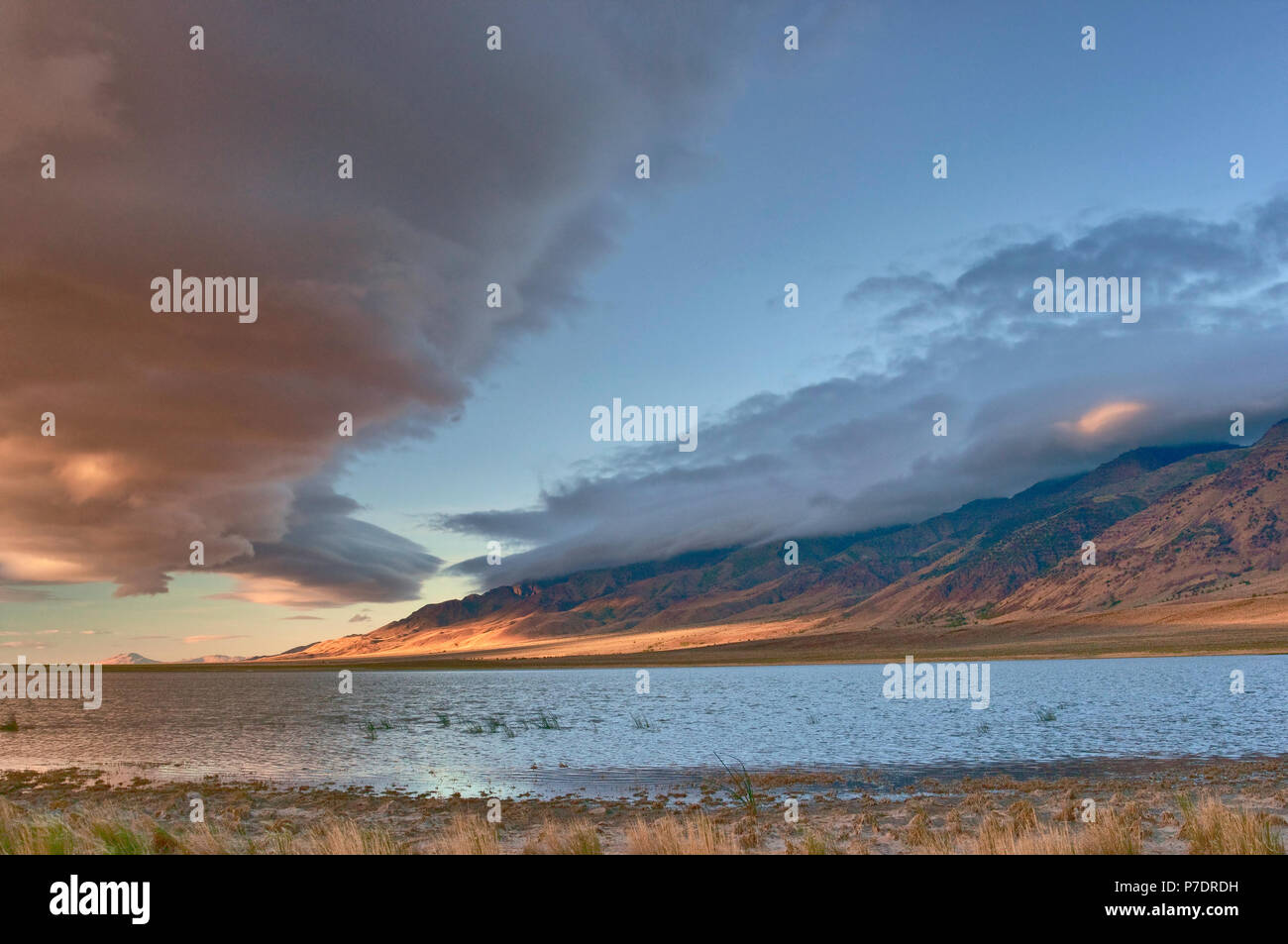 Big cloud in front of Steens Mountain, rising 5,000 feet above Mann ...