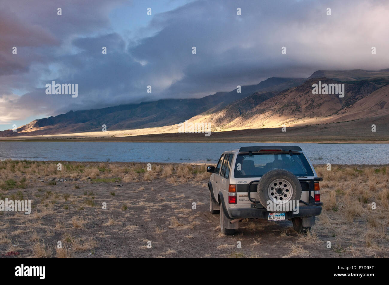 Camper's car near Mann Lake and Steens Mountain, sunrise, Great Basin ...