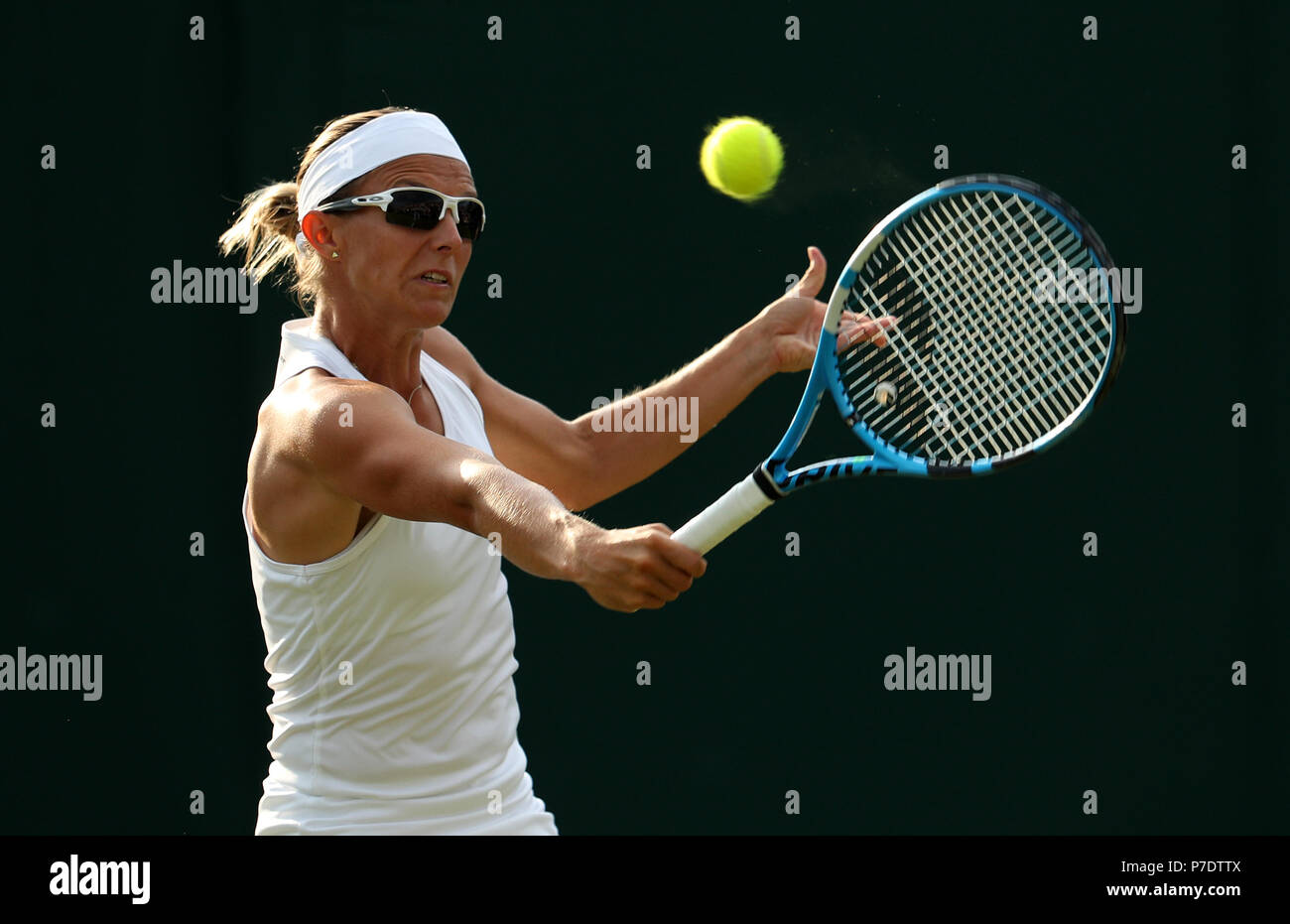 Kirsten Flipkens in action on day four of the Wimbledon Championships at the All England Lawn ...