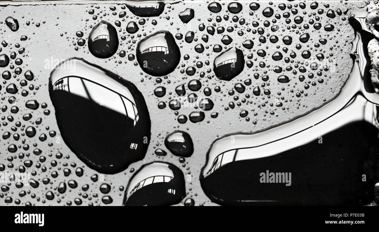 Amazing shape of rain drop on steel surface after rainy day, water ...